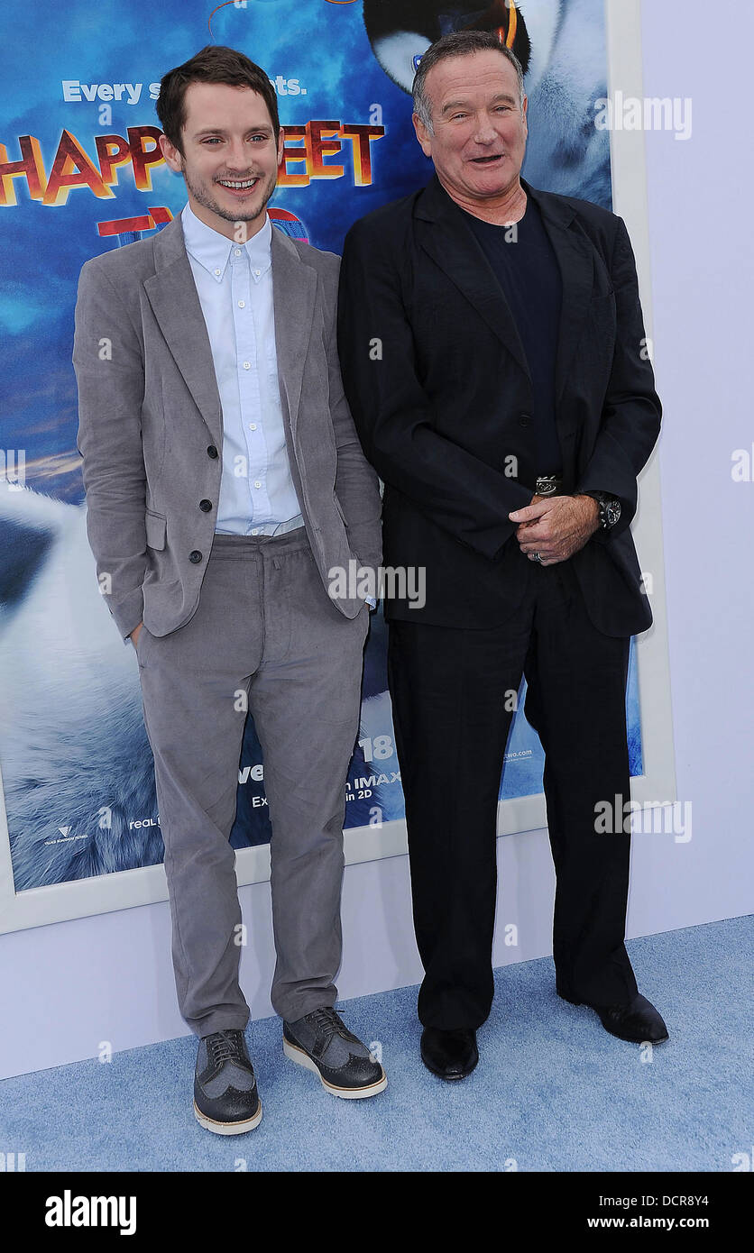 Elijah Wood and Robin Williams, at Warner Bros. World Premiere of ...