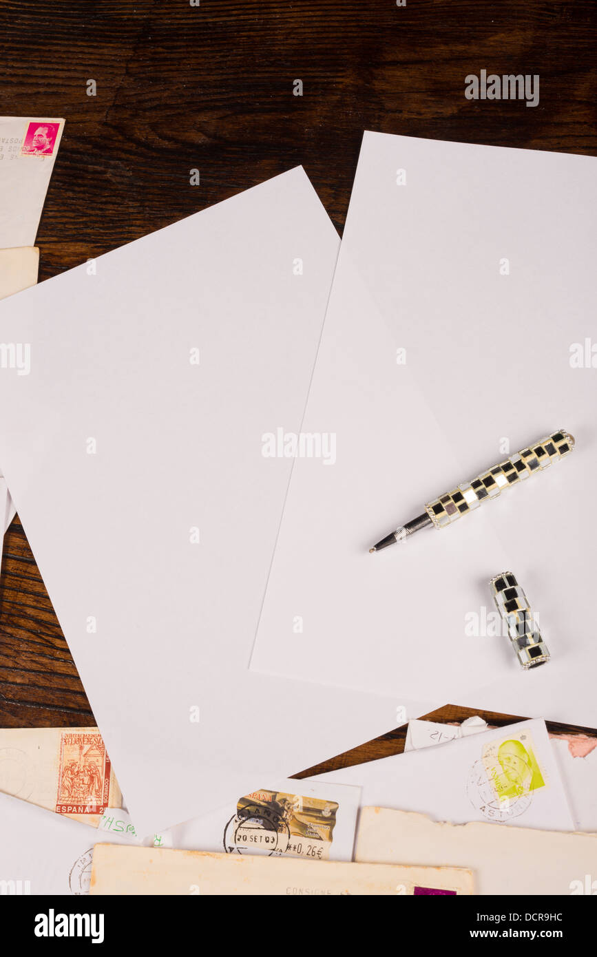 A stack of letters and white writing paper, a background Stock Photo ...