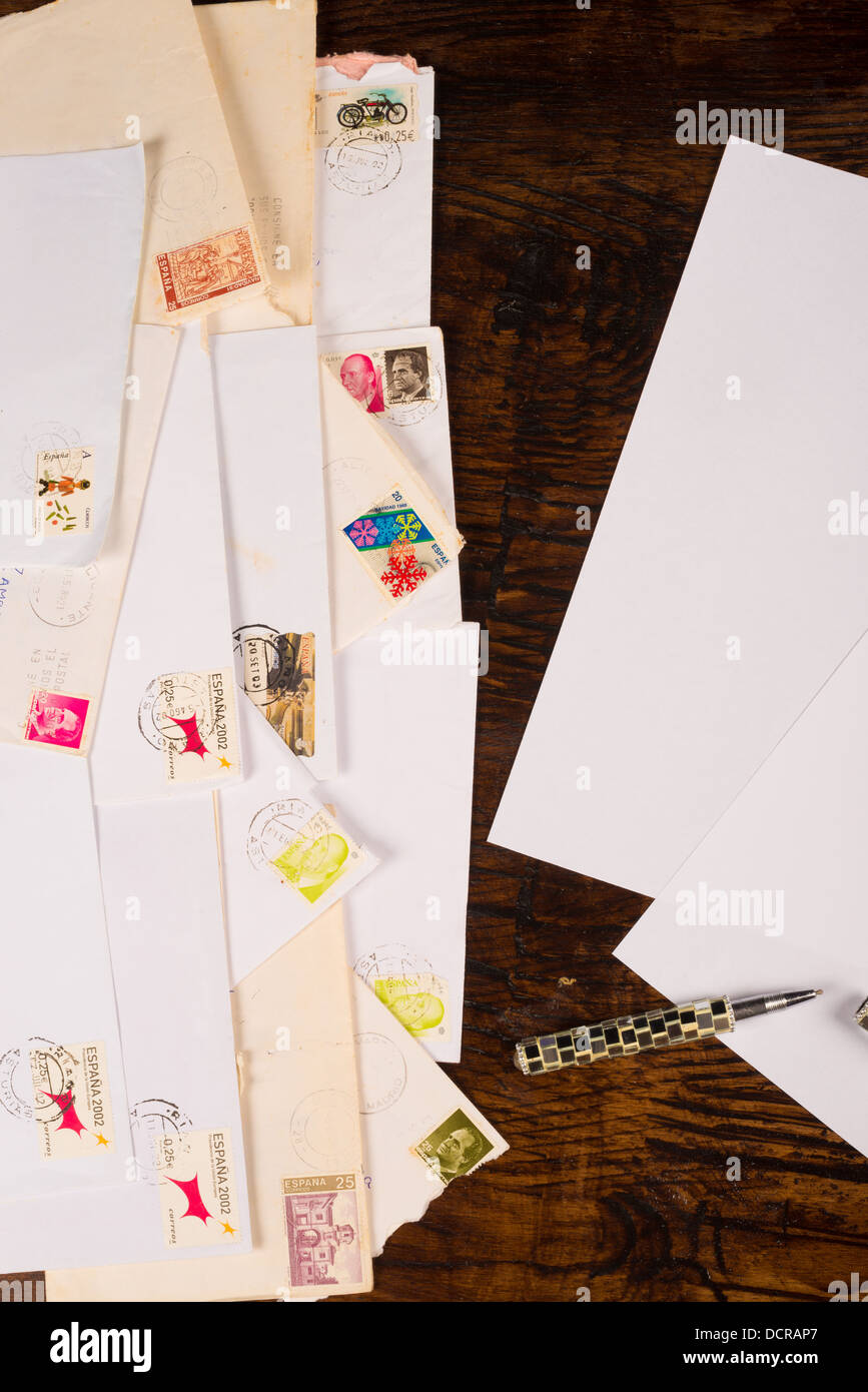 A stack of letters and white writing paper, a background Stock Photo ...