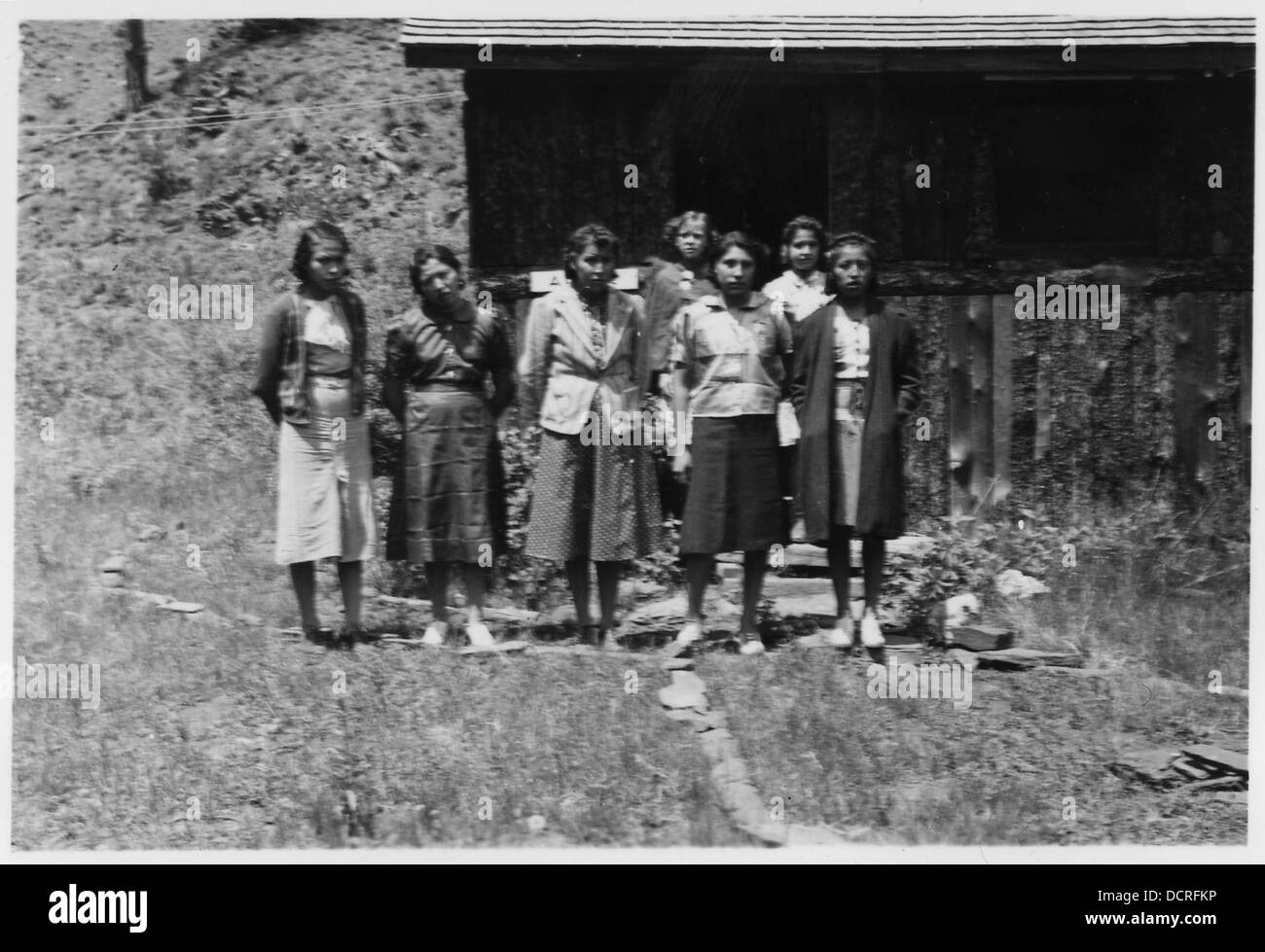 A group of young participants in a 4-H sewing club, where members learn ...
