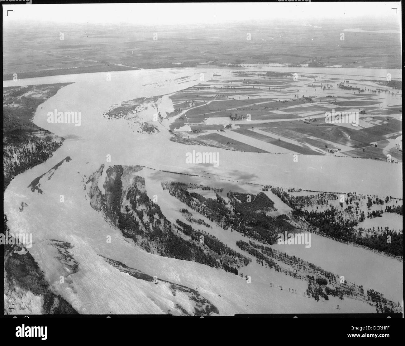 An aerial photograph shows flooded farmland, highlighting the extent of ...