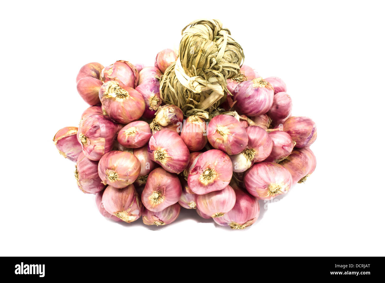 Shallots on white background Stock Photo - Alamy
