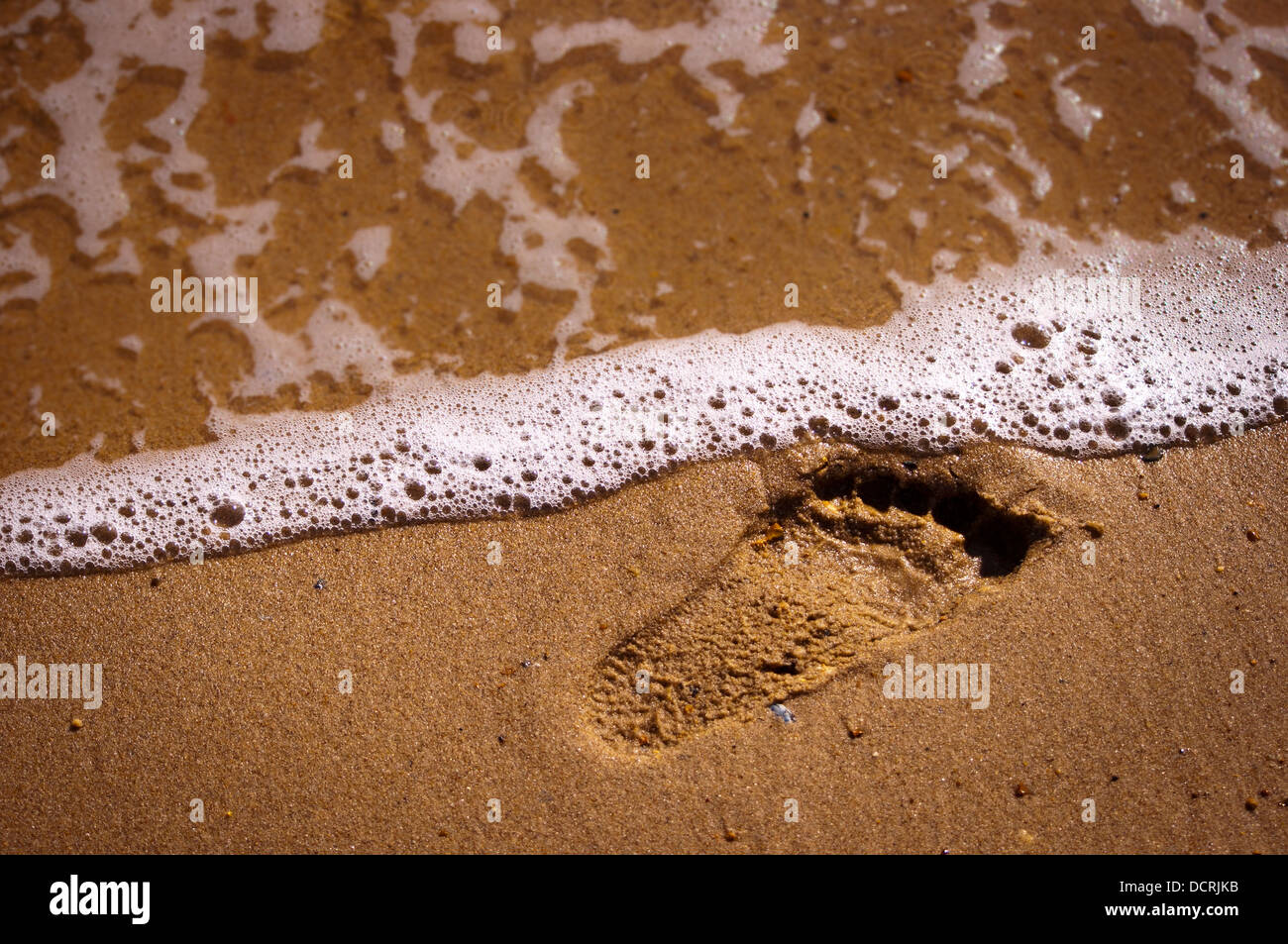 bare foot print marks on Norfolk sand Beach Stock Photo - Alamy