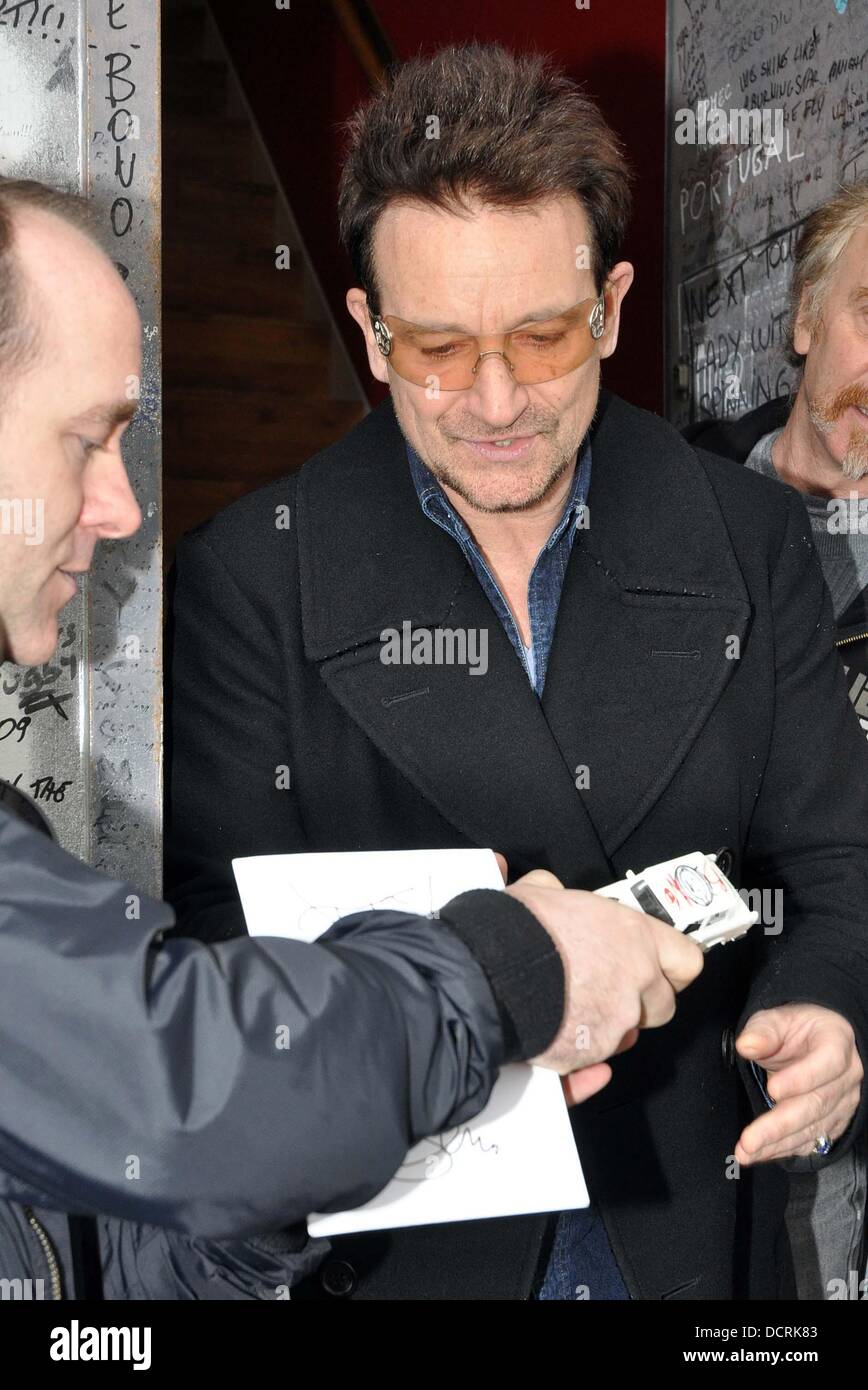Bono with a fan Gary Paul outside the Hanover Quay studios. Bono signed ...