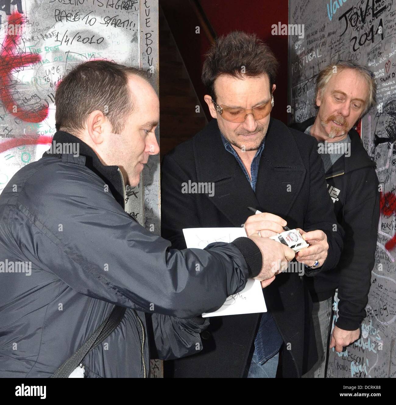 Bono with a fan Gary Paul outside the Hanover Quay studios. Bono signed ...