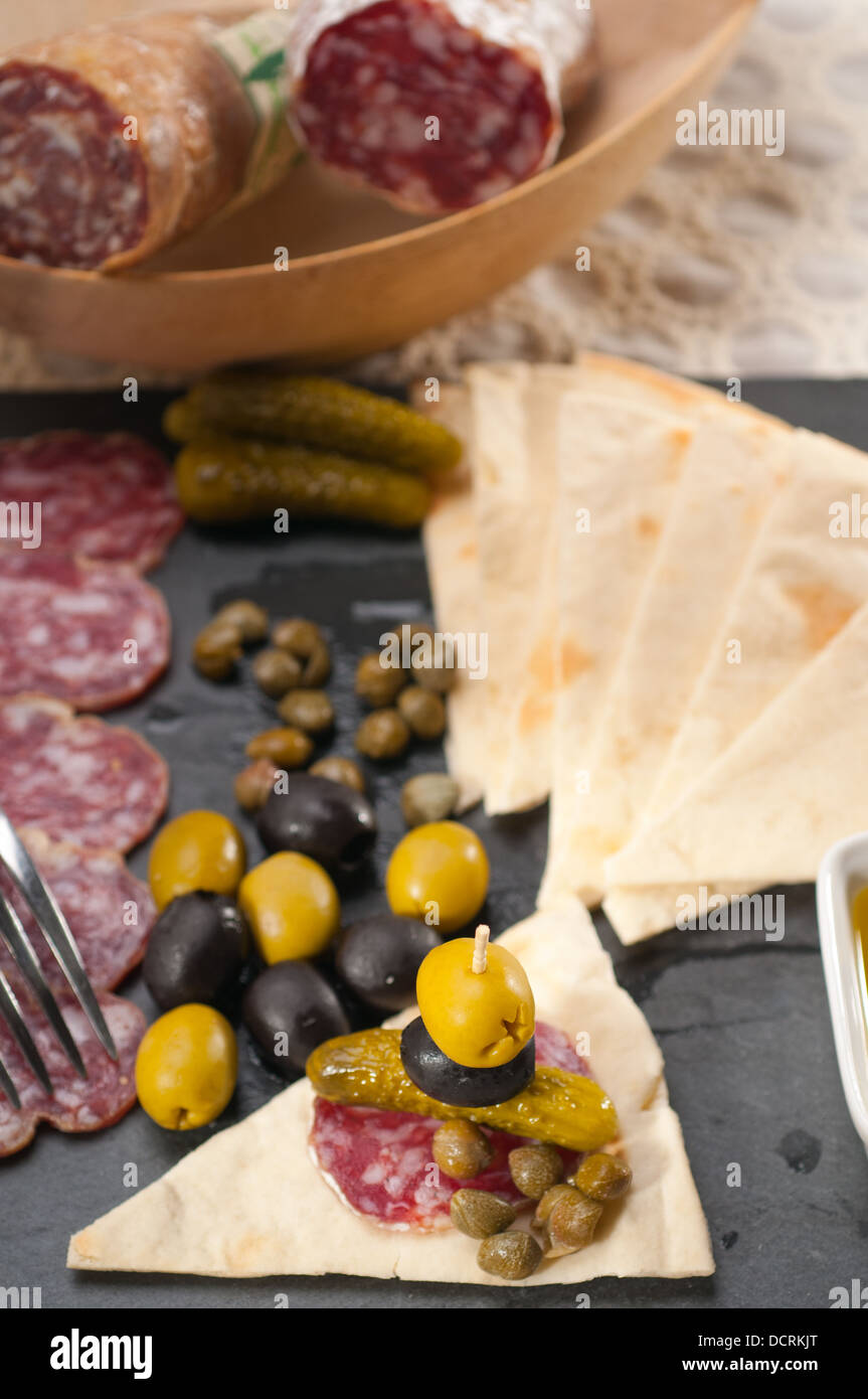 cold cut platter with pita bread and pickles Stock Photo - Alamy