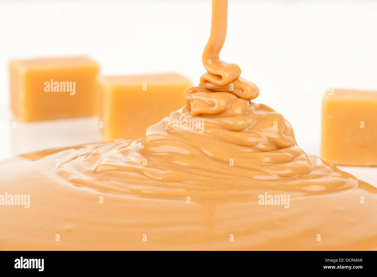 liquid caramel, isolated on white background Stock Photo - Alamy