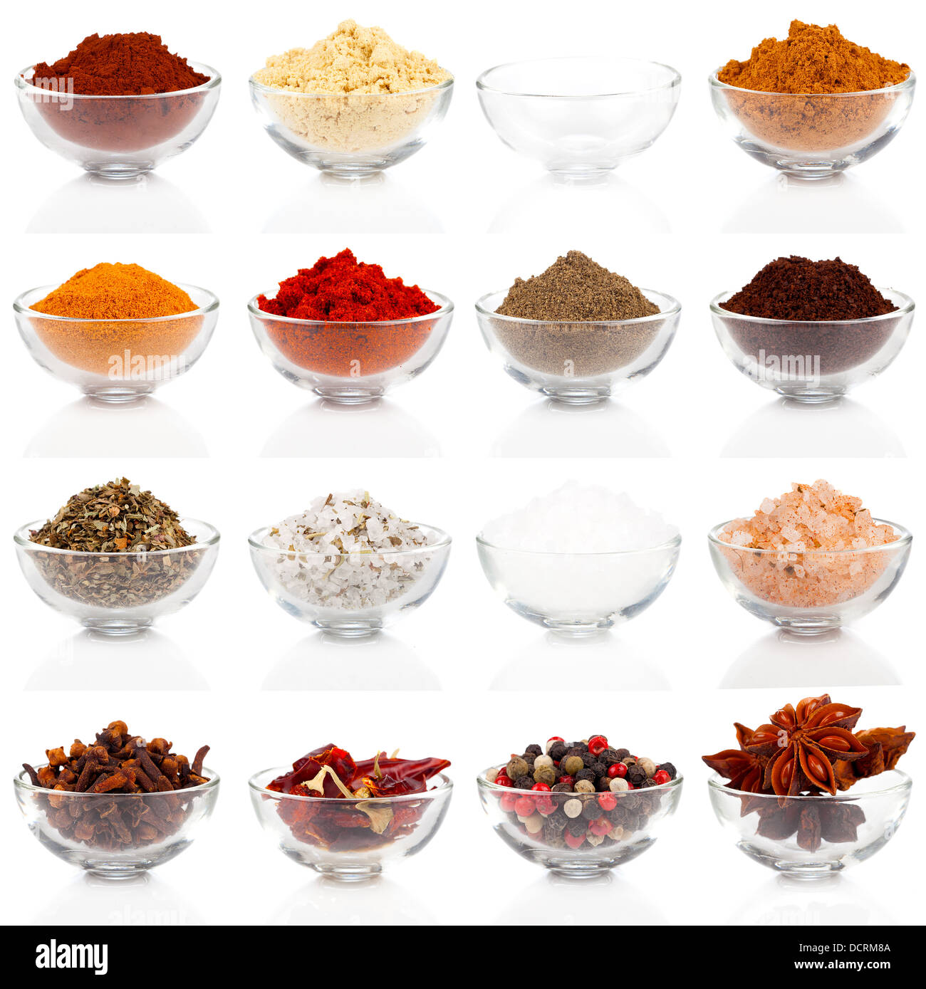 Variety of different spices in glass bowls for seasoning, isolat Stock ...