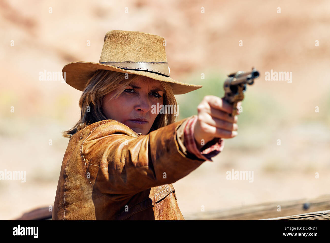 bad girl with a gun Stock Photo - Alamy