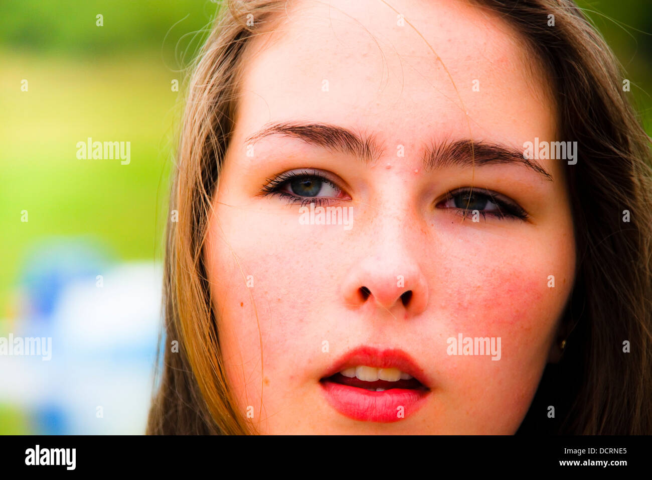 Teenage girl looking off camera Stock Photo - Alamy