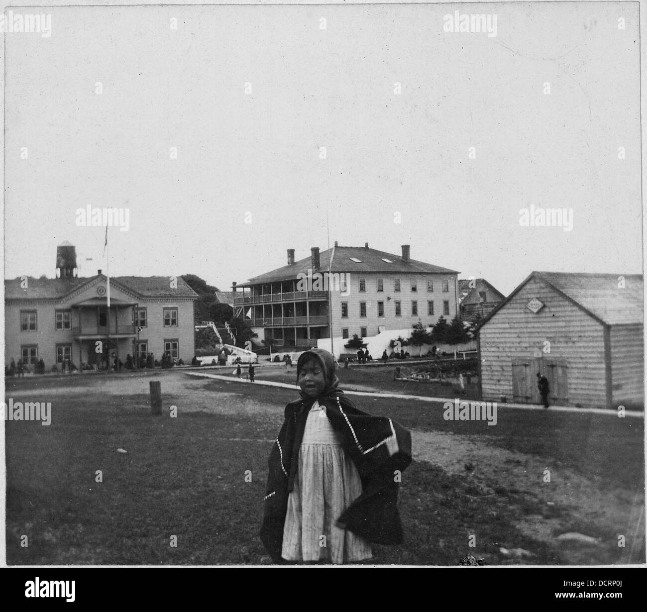 A portrait of a bashful little Native American girl in Sitka, capturing ...