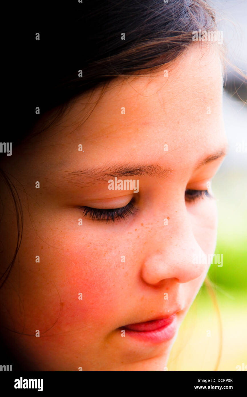Teenage girl looking off camera Stock Photo - Alamy