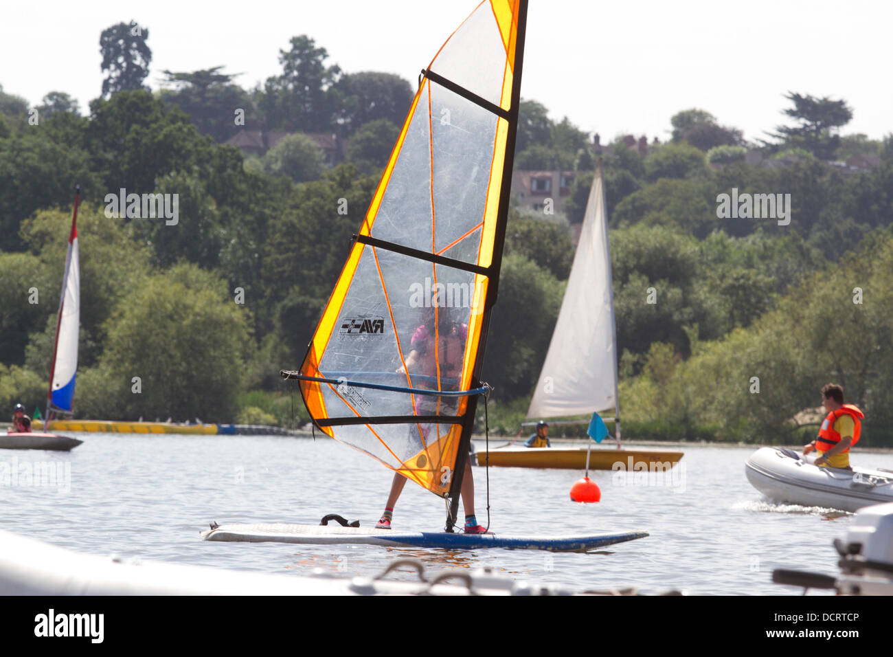 Wimbledon London, UK. 21st August 2013. Dinghies sail on Wimbledon lake ...