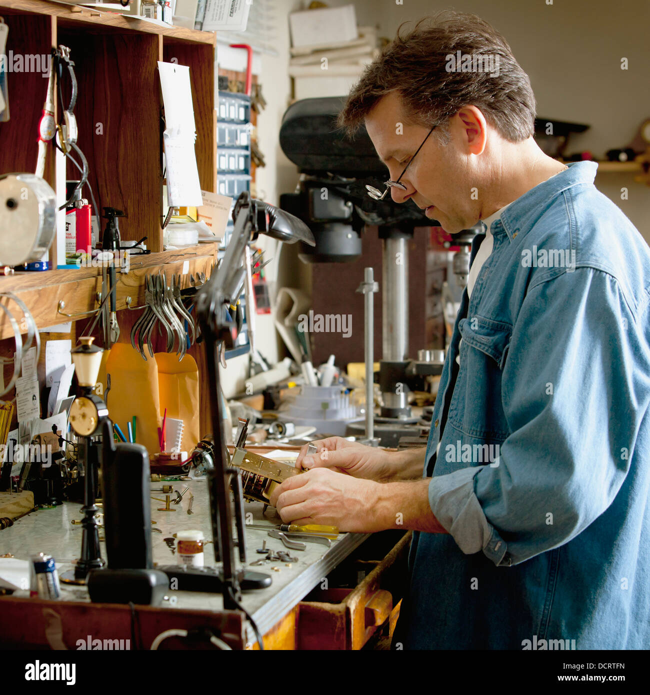 A clock maker and repair hi-res stock photography and images - Alamy