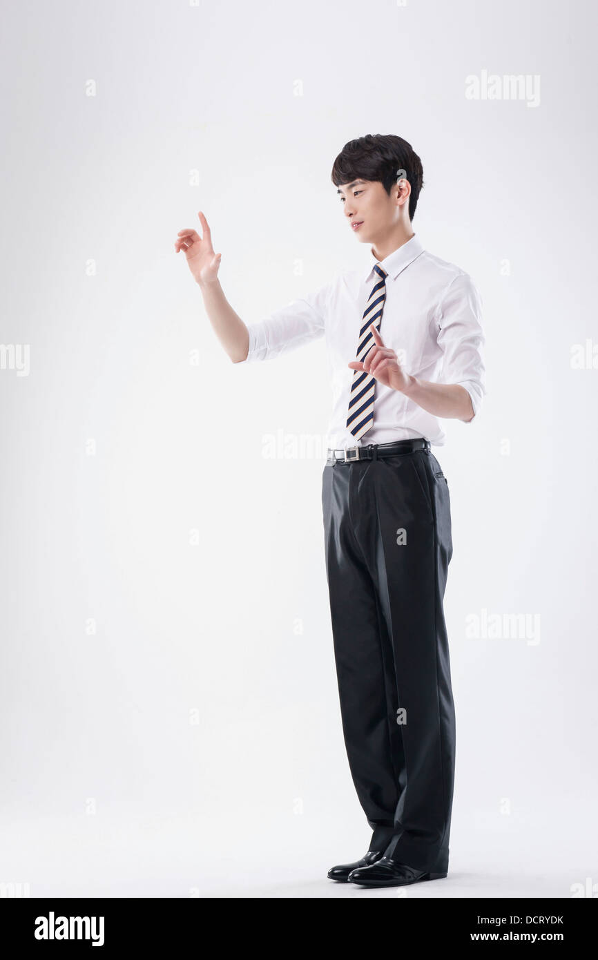 a business man posing Stock Photo - Alamy