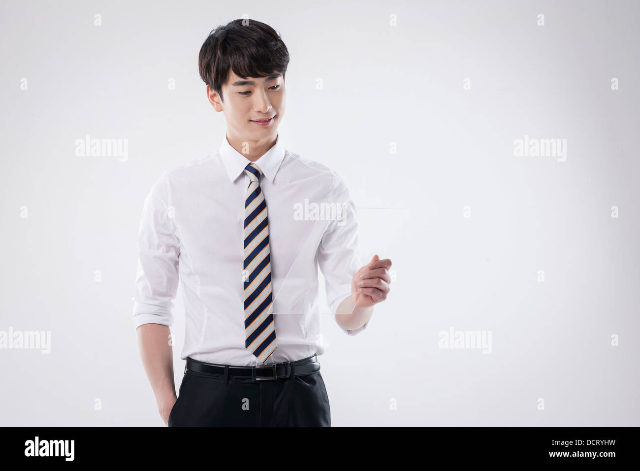 a business man holding a transparency sheet Stock Photo - Alamy