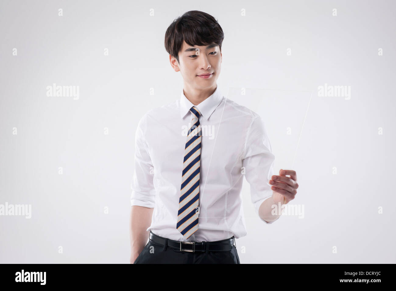 a business man holding a transparency sheet Stock Photo - Alamy