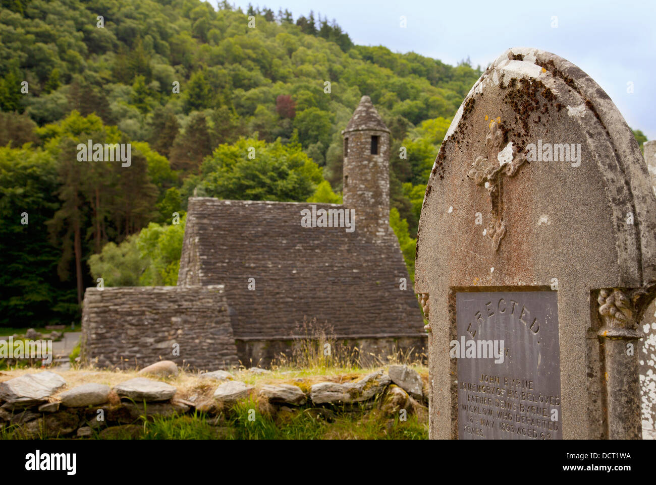 A Monastery And A Tombstone In A Cemetery; Glendalough, County Wicklow ...