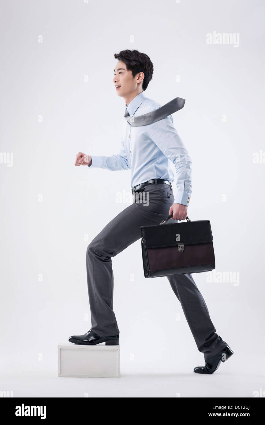 a business man with a case Stock Photo - Alamy
