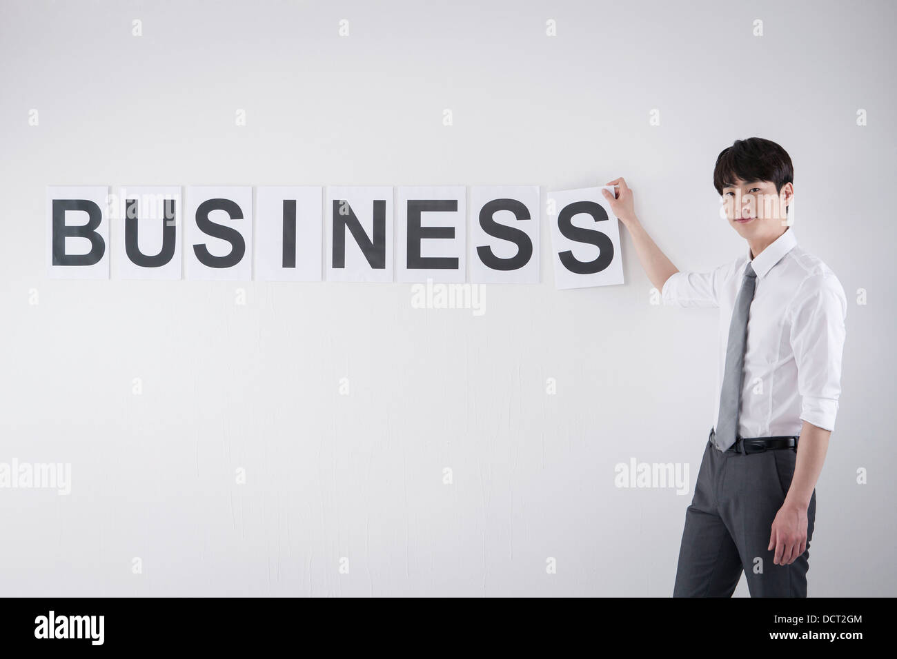 a business man with the word business Stock Photo - Alamy