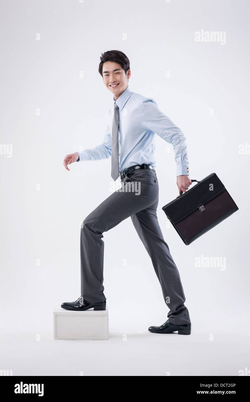 a business man with a case Stock Photo - Alamy