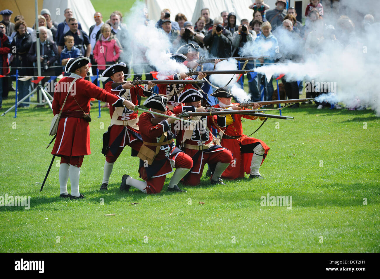 Redcoats fire on the Jacobites during a re-enactment at Scotland's ...