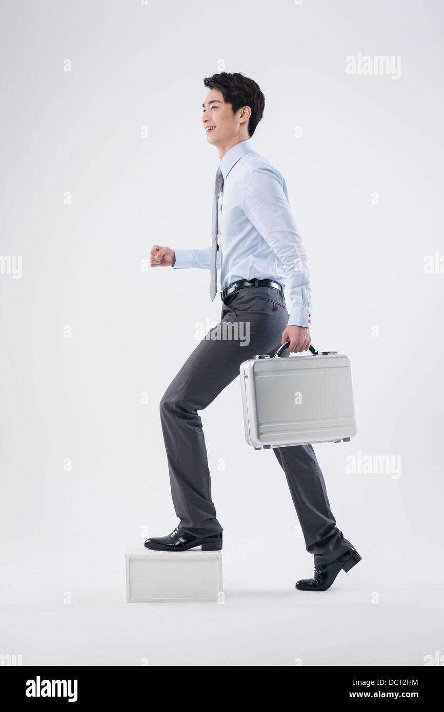 a business man with a case Stock Photo - Alamy