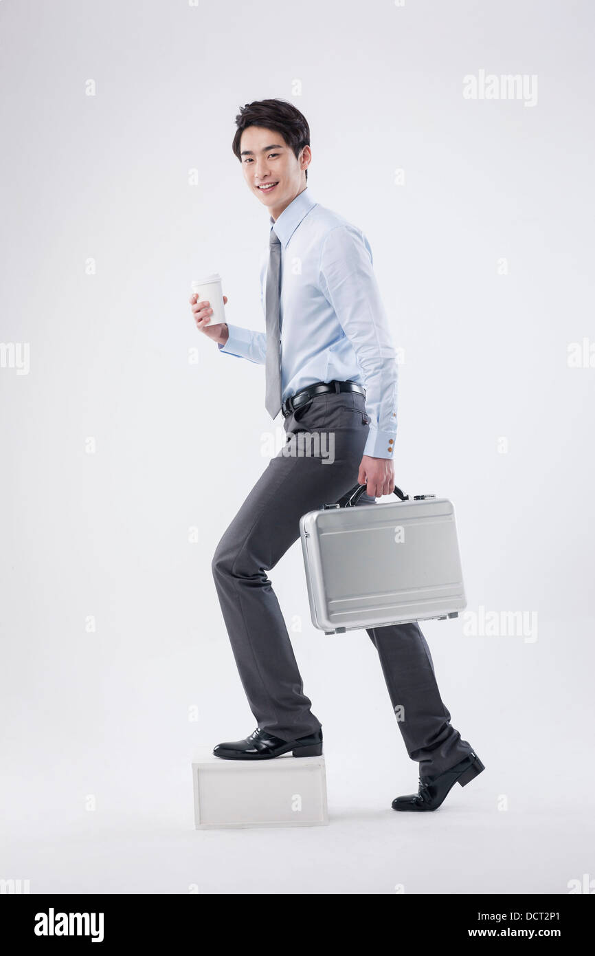a business man with a case Stock Photo - Alamy