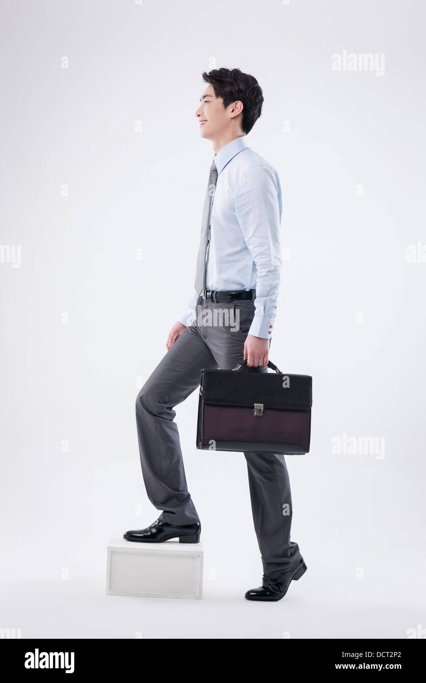 a business man with a case Stock Photo - Alamy