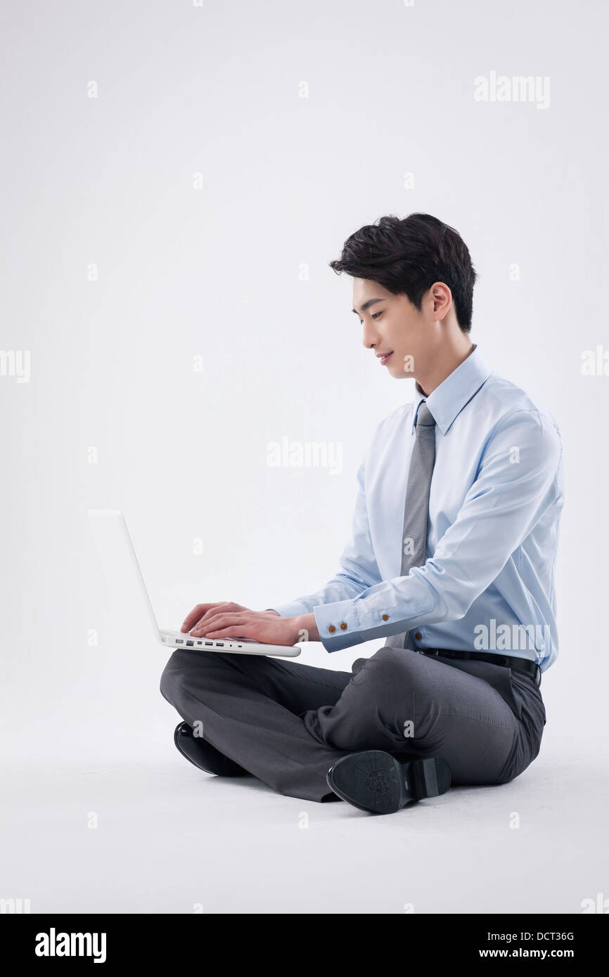 a business man with a laptop Stock Photo - Alamy