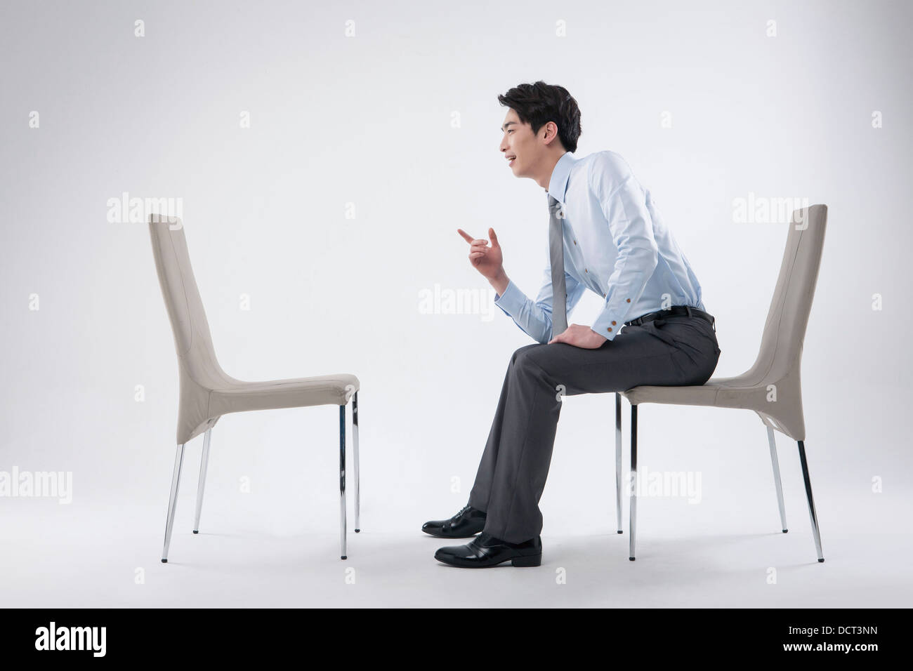 Person talking empty chair hi-res stock photography and images - Alamy