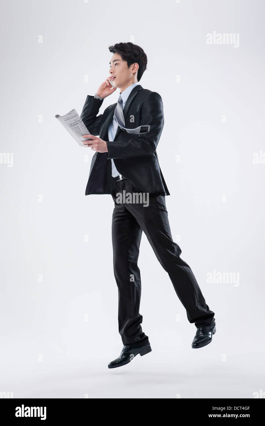 a business man running Stock Photo - Alamy