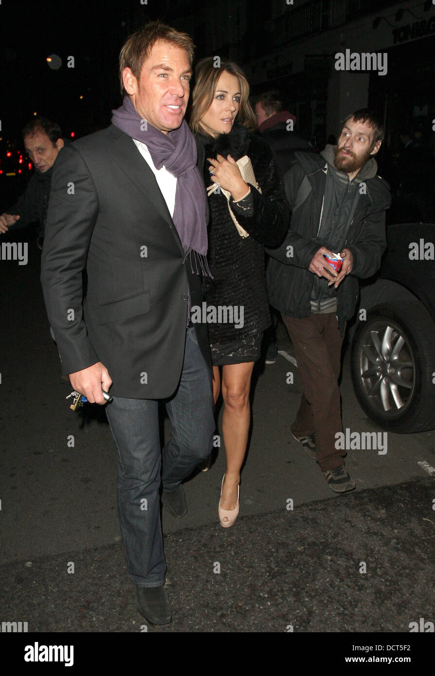 Elizabeth Hurley and Shane Warne leaving C London restaurant London ...