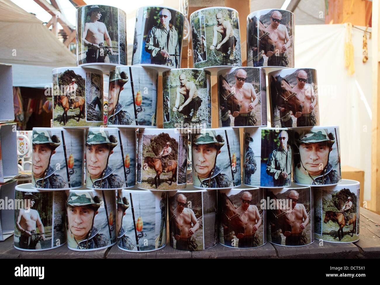 Cups with printed-on portraits of Russian President Vladimit Putin are ...
