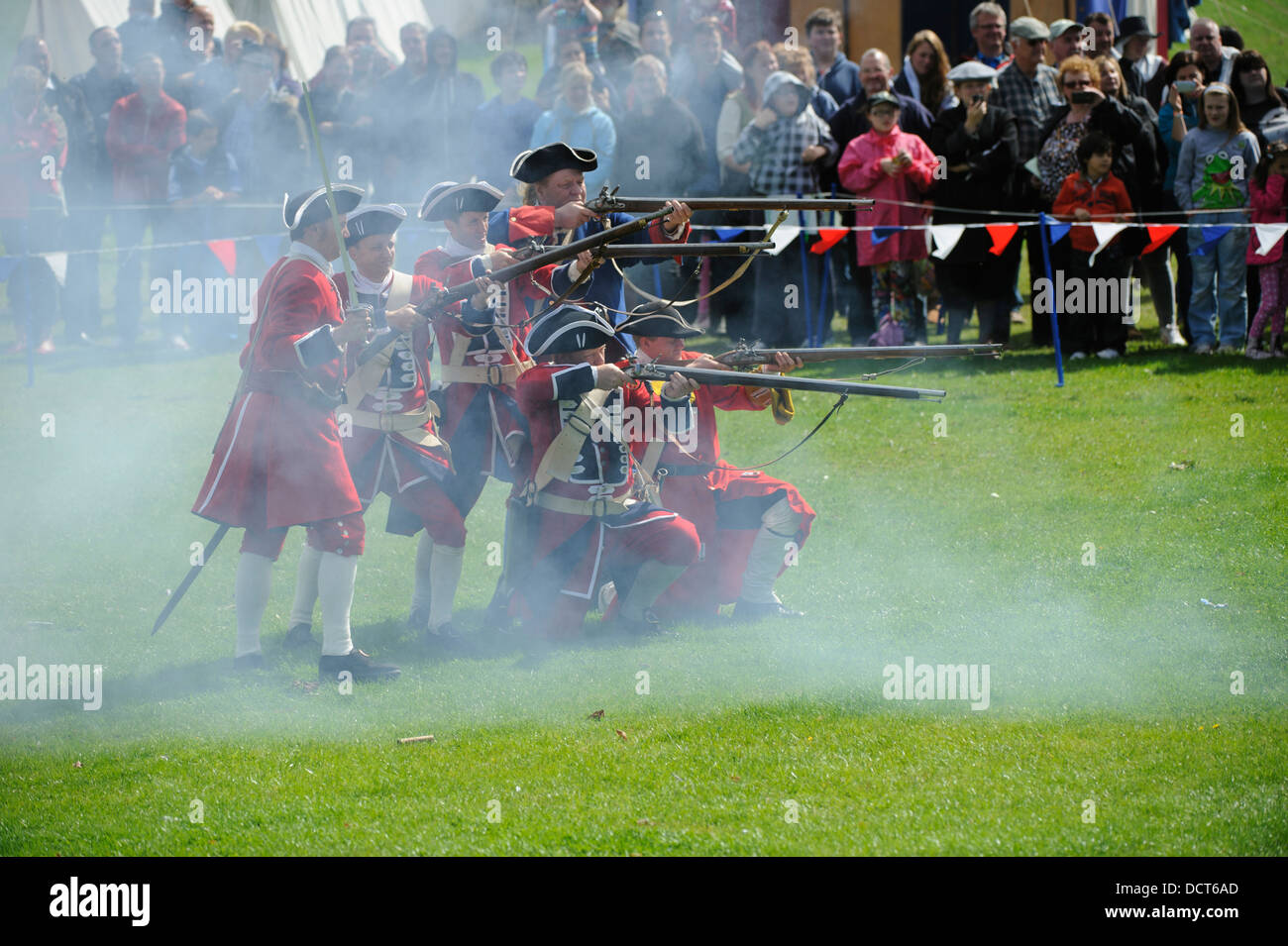 Redcoats fire on the Jacobites during a re-enactment at Scotland's ...