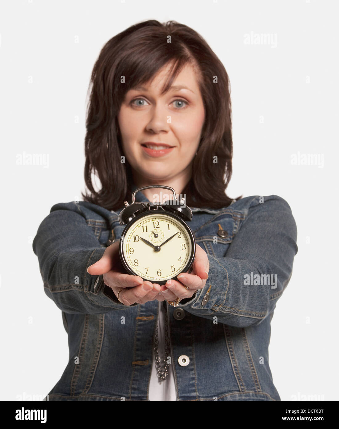 Woman Focusing On The Time Stock Photo - Alamy