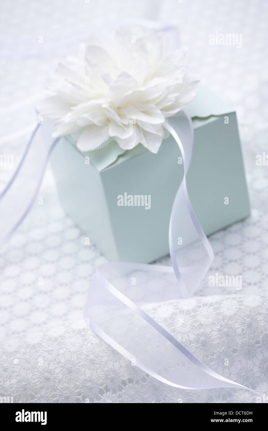 a white present with a flower Stock Photo - Alamy