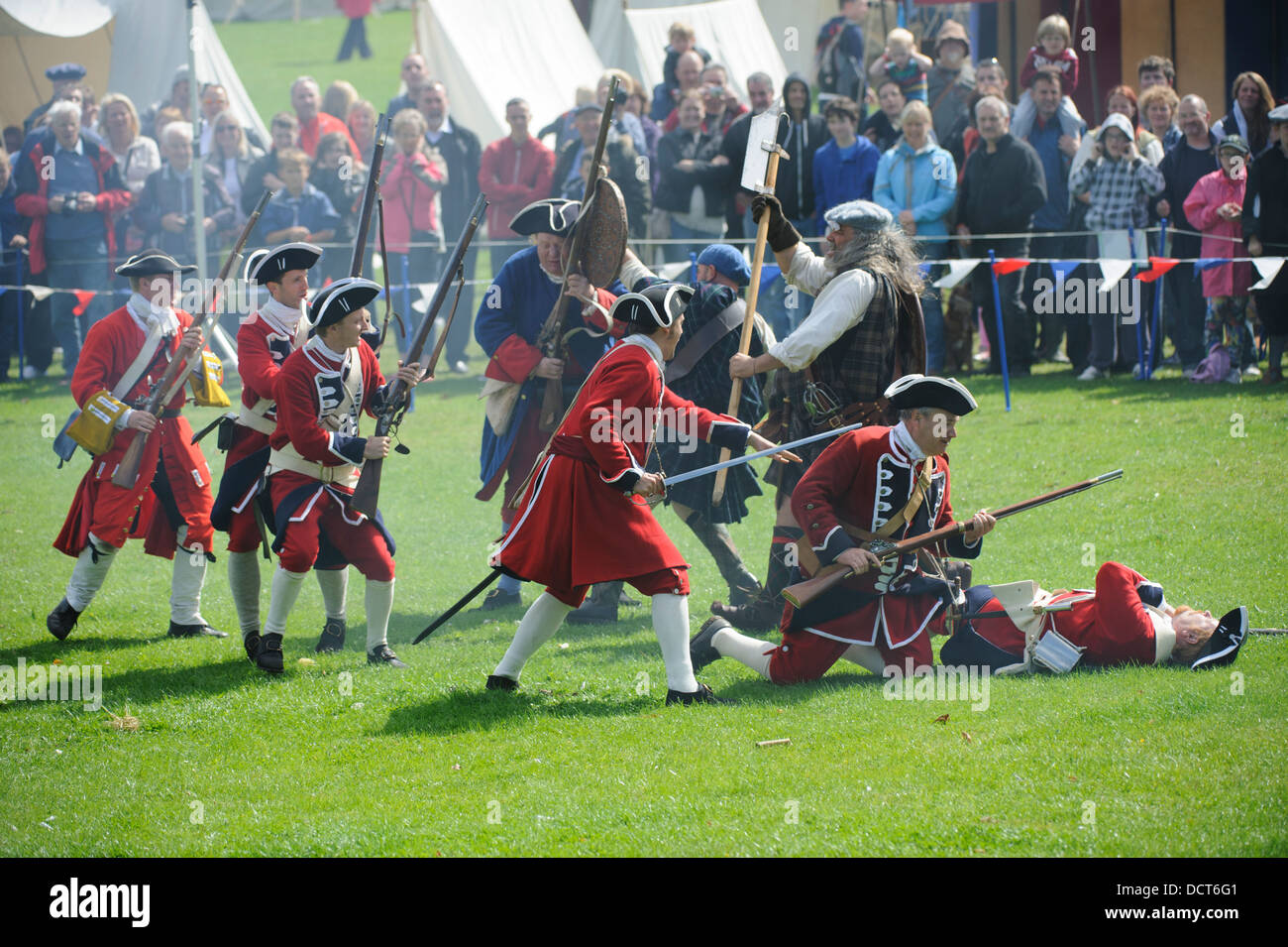 Redcoats fire on the Jacobites during a re-enactment at Scotland's ...