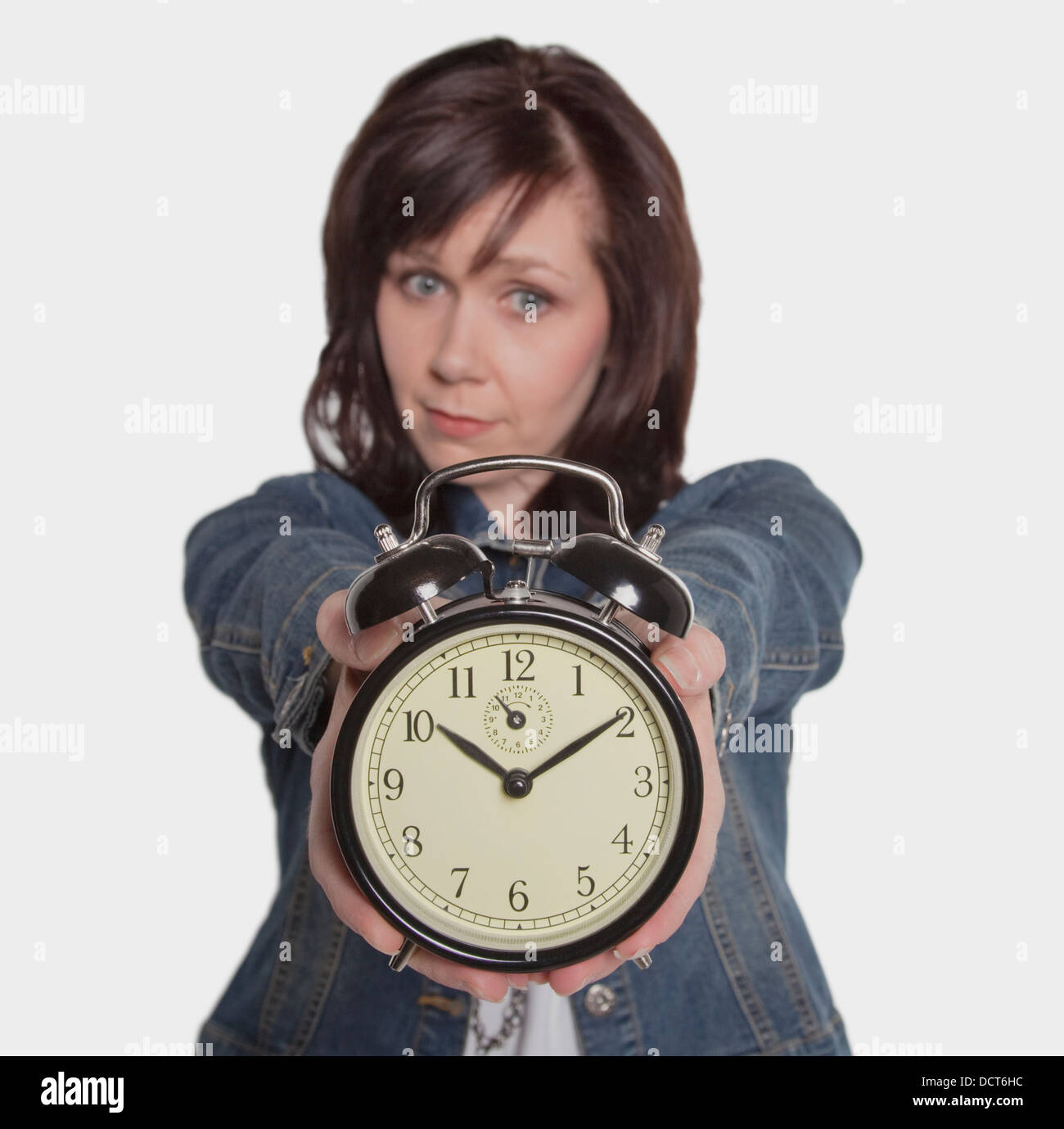 Woman Focusing On The Time Stock Photo - Alamy