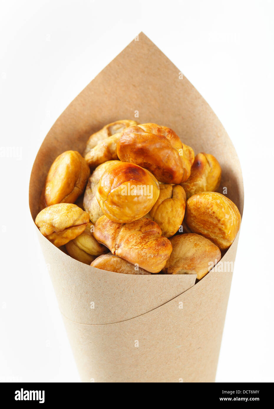 Peeled roasted chestnuts in a paper cone Stock Photo - Alamy