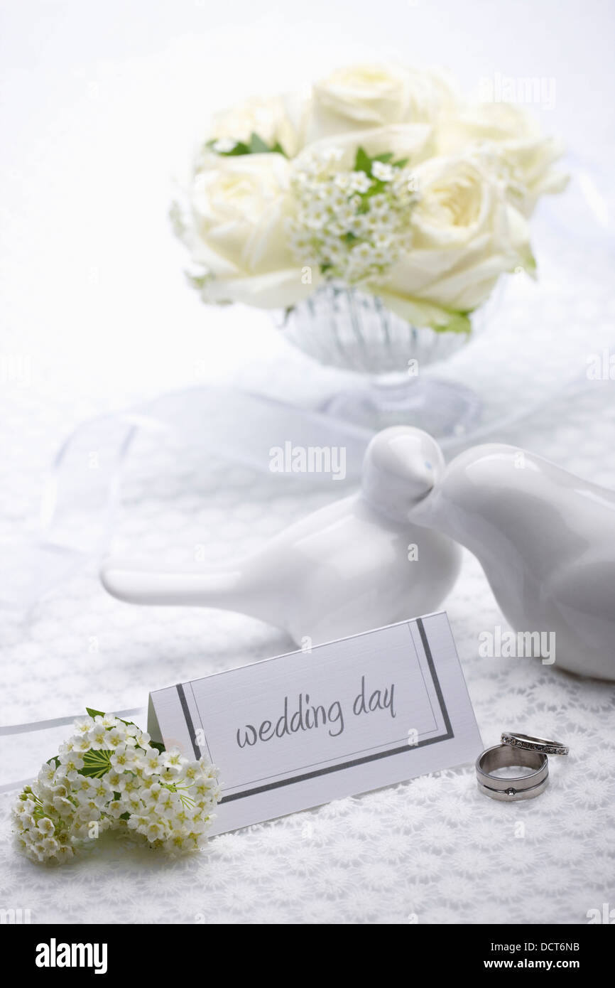 a wedding card with wedding rings Stock Photo - Alamy