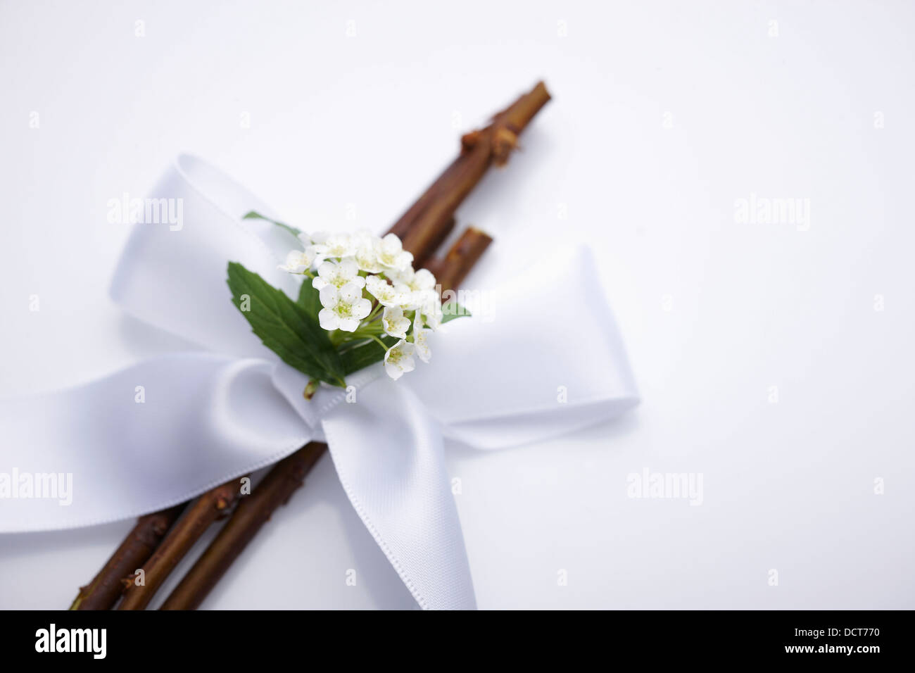 white ribbon and flowers Stock Photo - Alamy