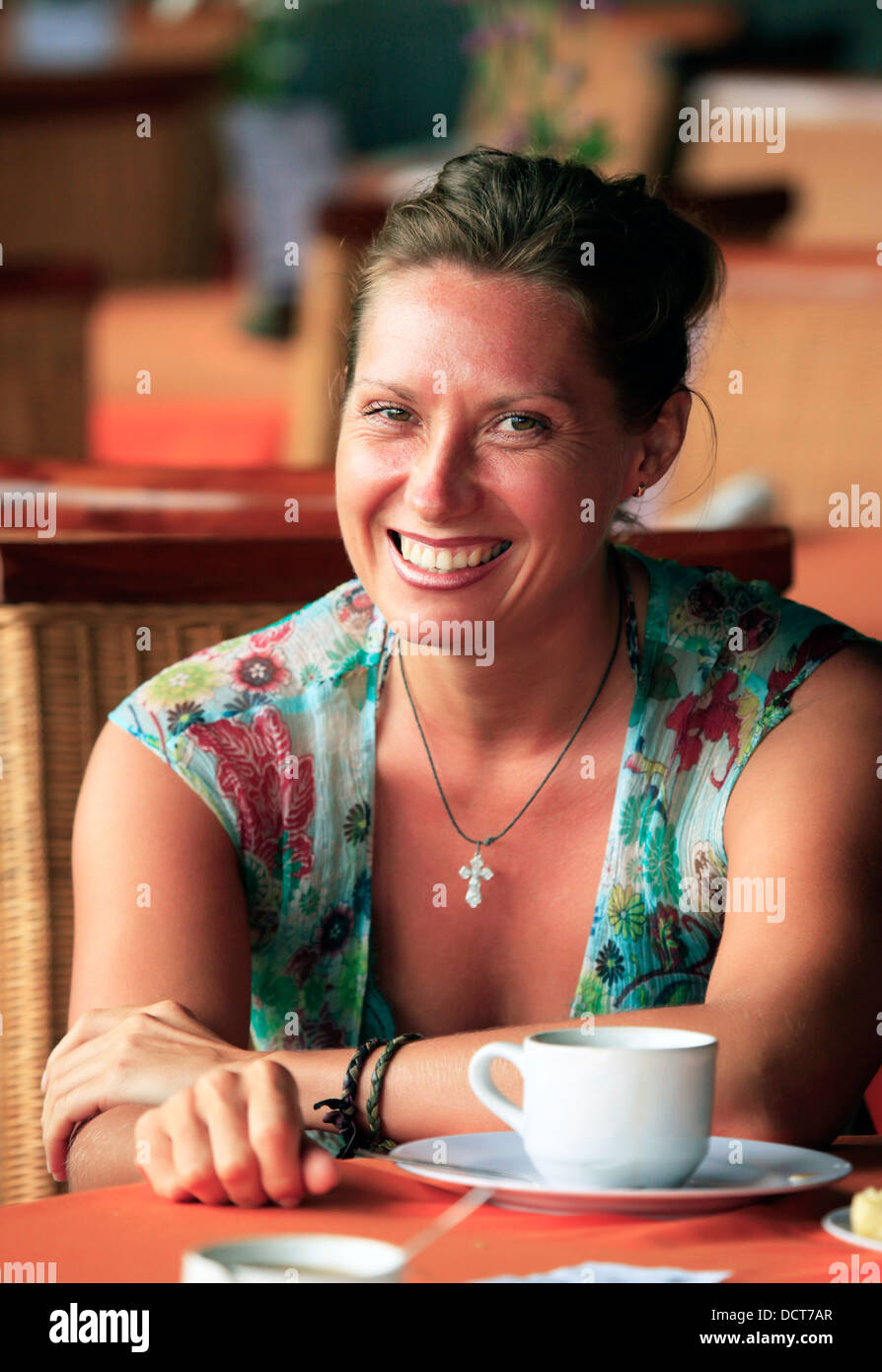 Woman at cafe Stock Photo - Alamy
