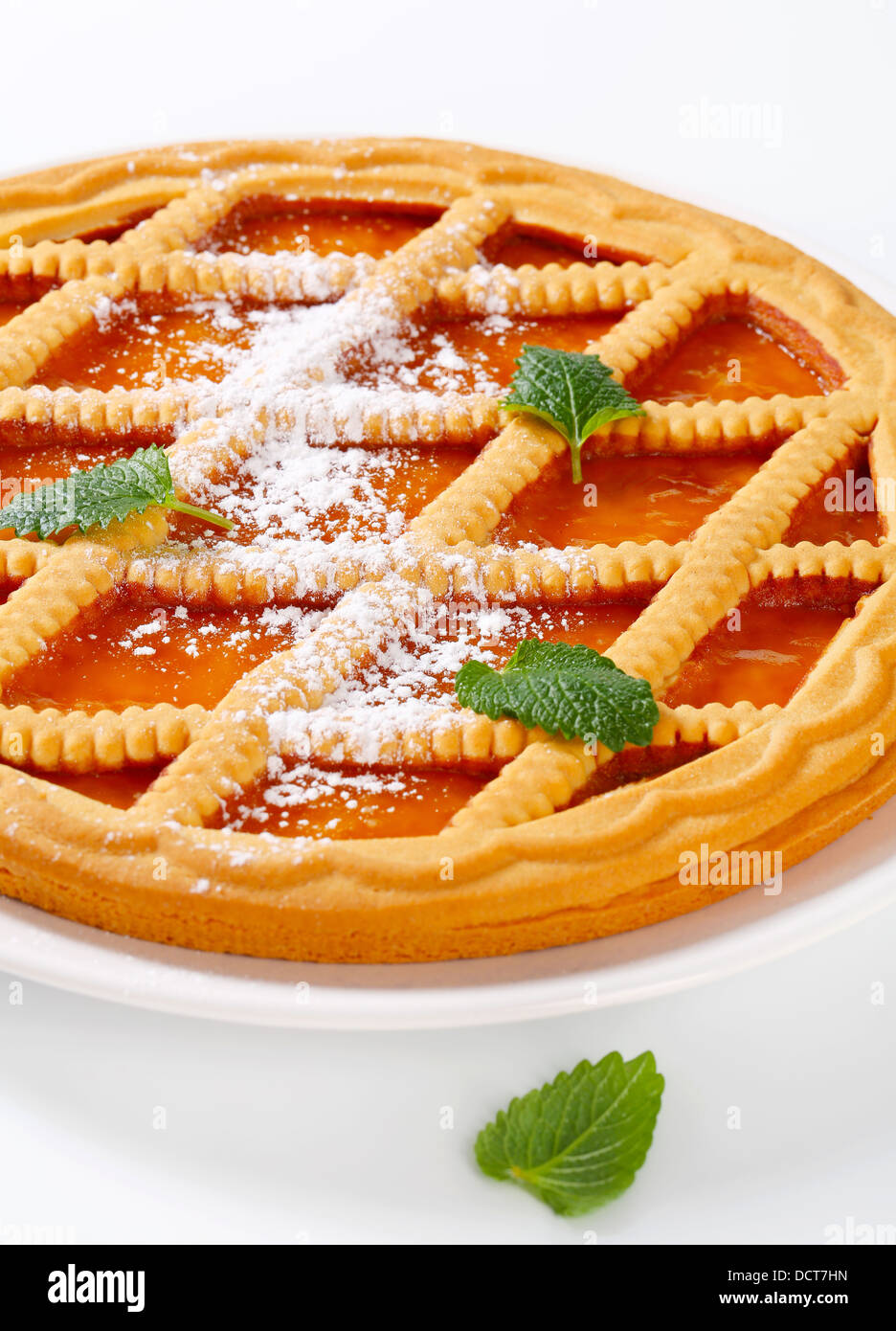 Round lattice topped apricot tart Stock Photo - Alamy