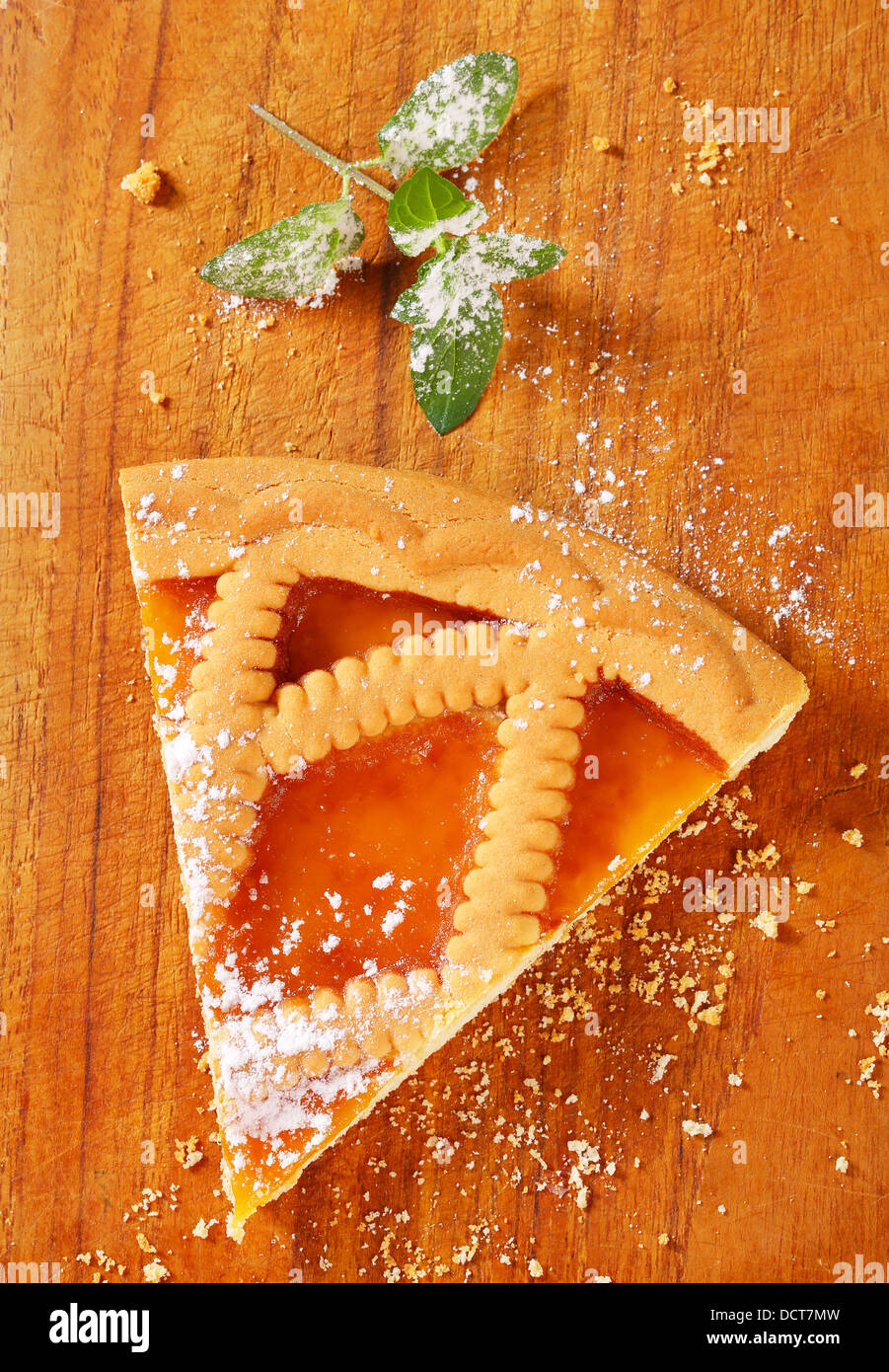 Slice of Linzer apricot tart Stock Photo - Alamy