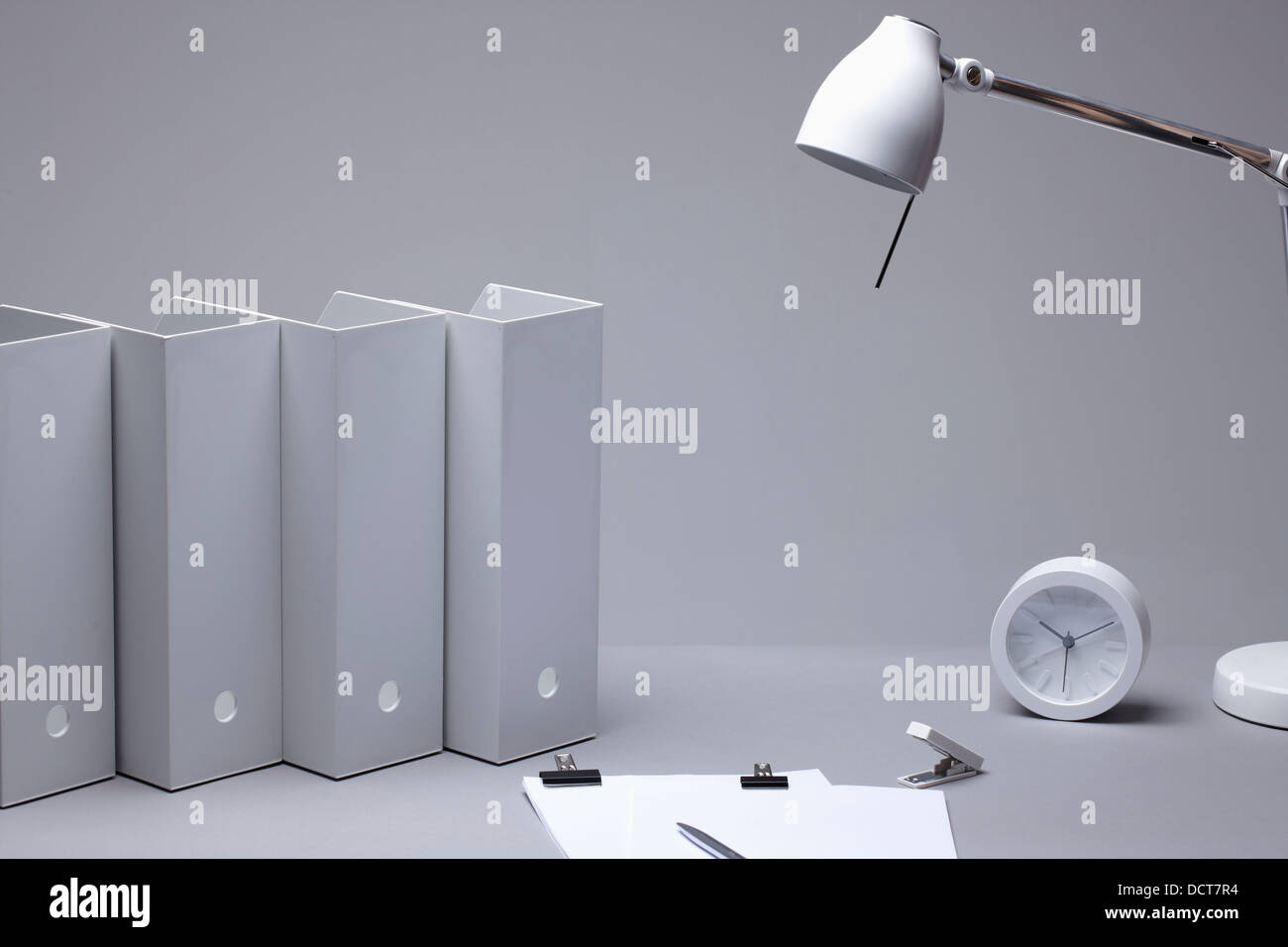 a work desk with folders Stock Photo - Alamy