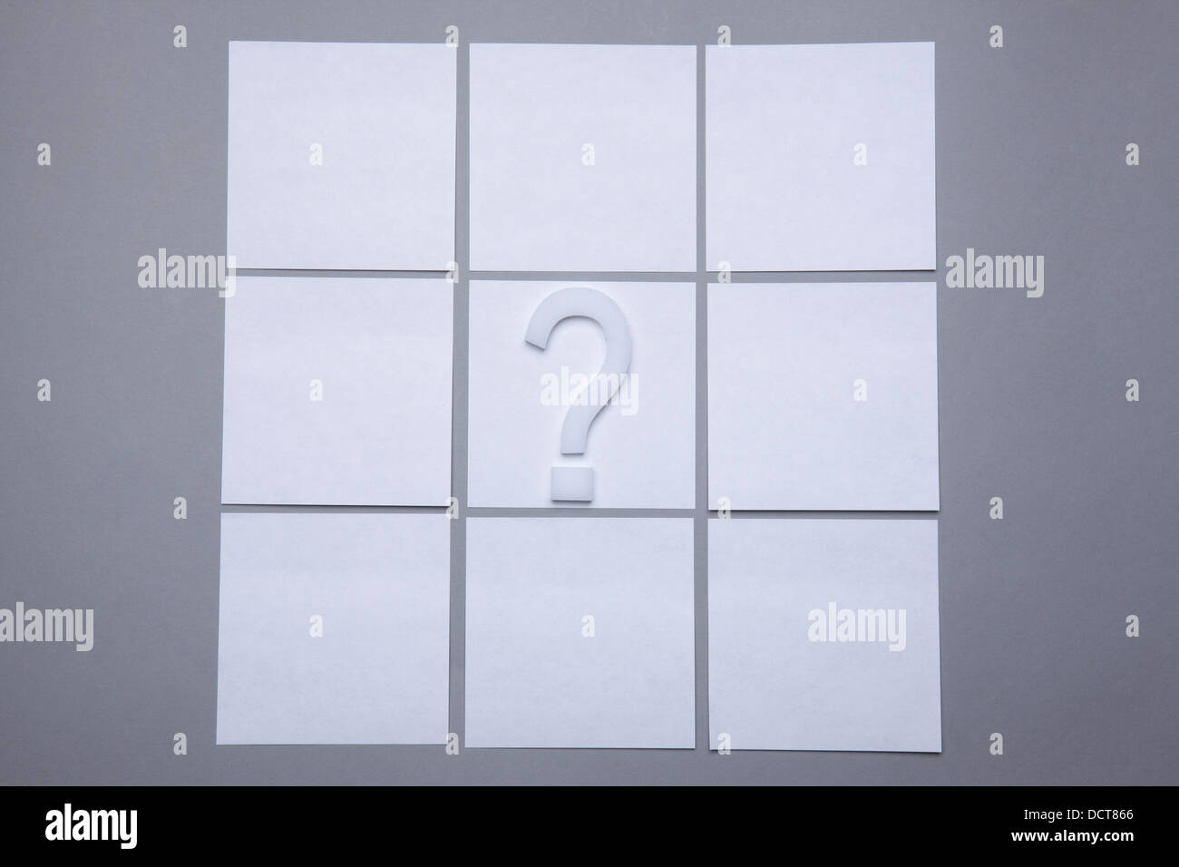 blank papers and a question mark Stock Photo - Alamy