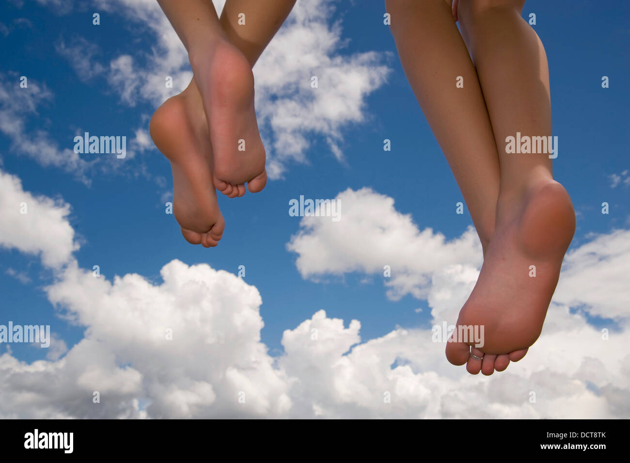 Angel Concept; Feet Floating In Sky Against Clouds Stock Photo - Alamy