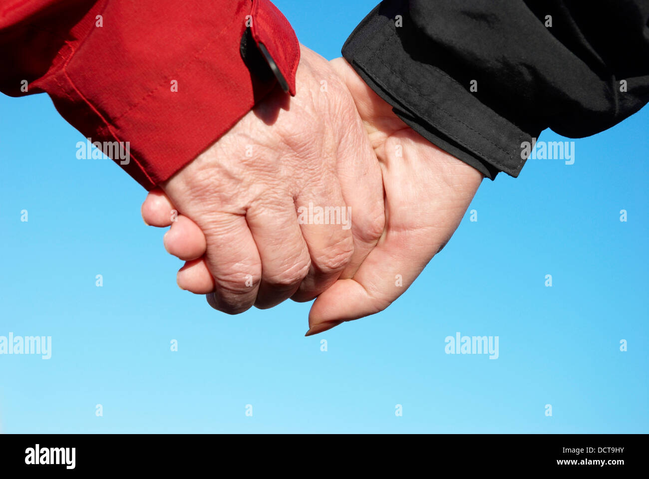 Arms linked together hi-res stock photography and images - Alamy