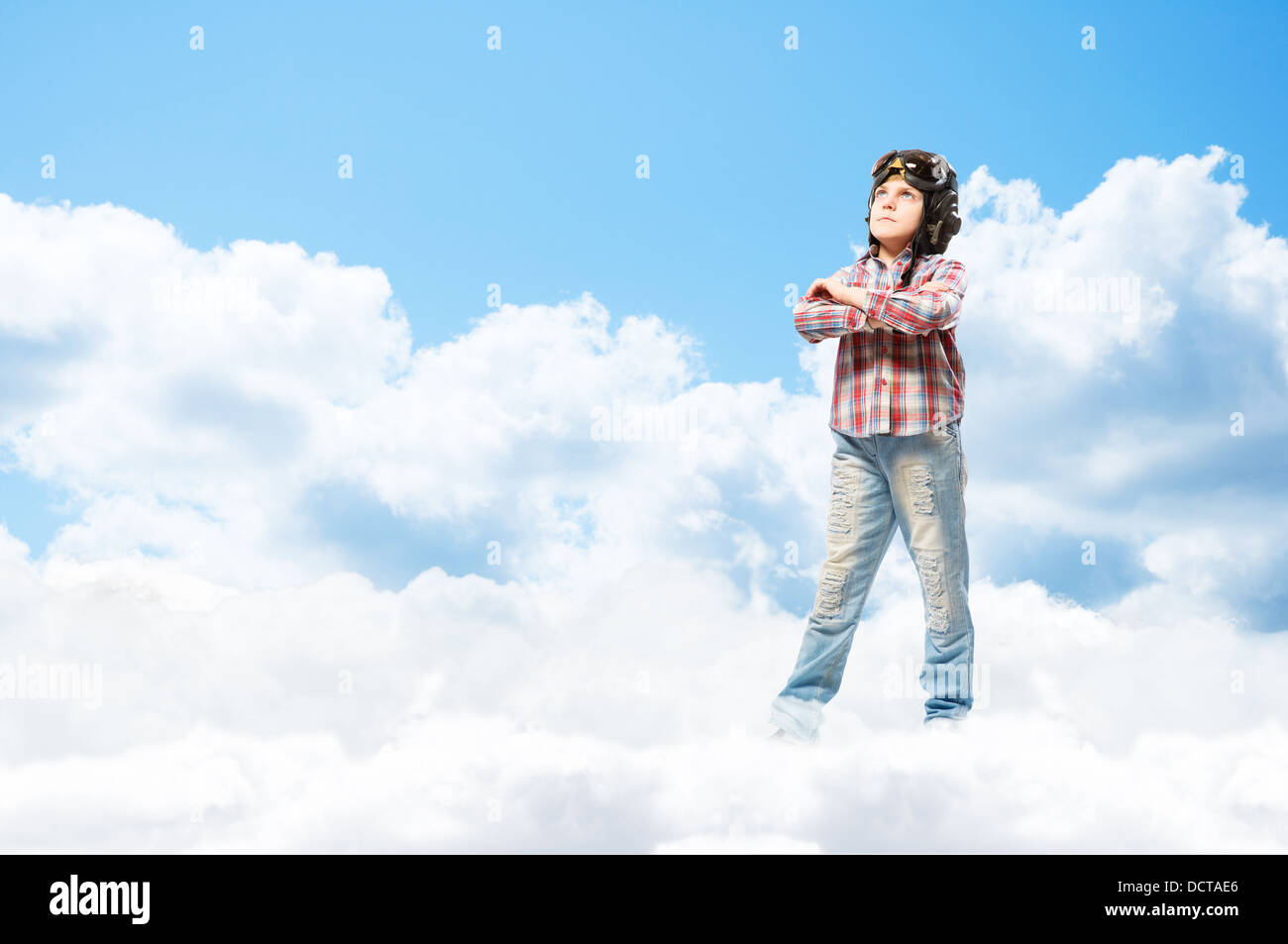 Boy in helmet pilot dreaming of becoming a pilot Stock Photo - Alamy